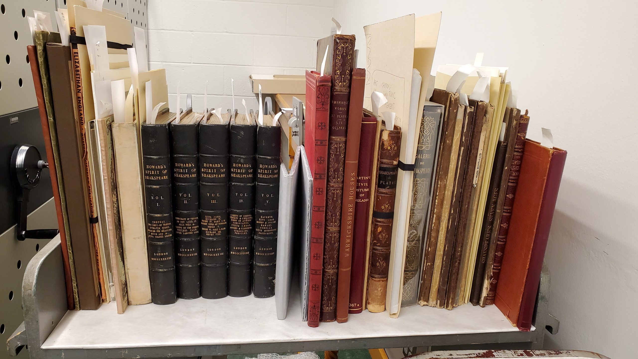 Using cardboard spacers to fill gaps on the shelf | Folger Shakespeare ...